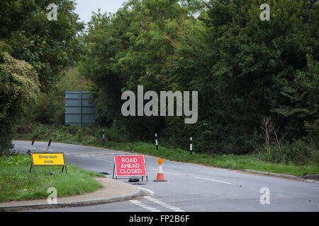 Diverted traffic sign. Road sign showing a diversion all the way around ...