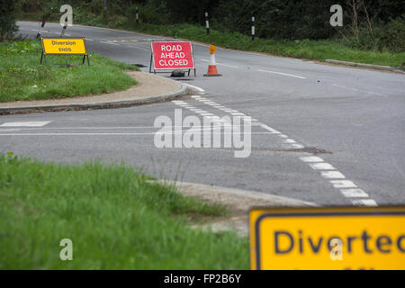 Diverted traffic sign. Road sign showing a diversion all the way around ...