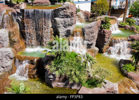beautiful man-made waterfall in the park Stock Photo - Alamy