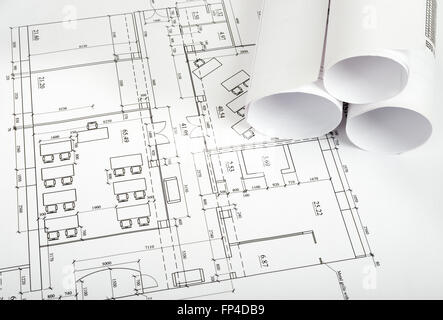 Blueprints and rolls of blueprints, side view. Building concept Stock ...
