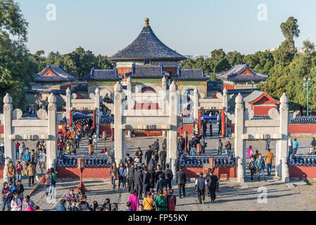 Tourists visit the Temple of Heaven Park and admire the magnificent ...