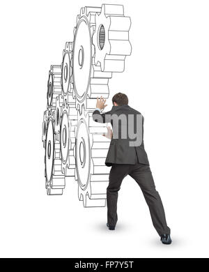 Businessman pushing cog wheels isolated on white background Stock Photo ...