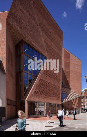The sharp angled brickwork and glass entrance of the LSE Student Centre ...