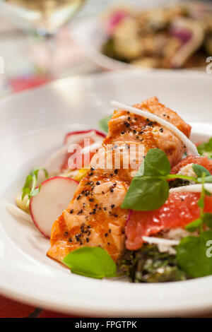 grilled salmon with ruby red grapefruit slices, crab, jicama and ...