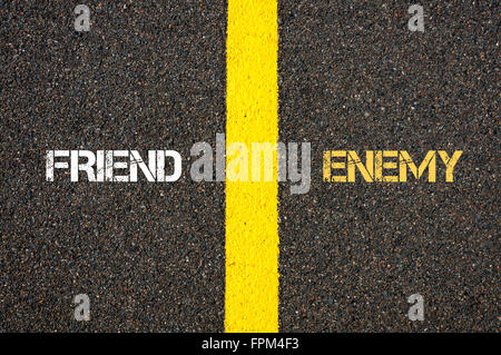 Antonym concept of FRIEND versus ENEMY written over tarmac, road ...
