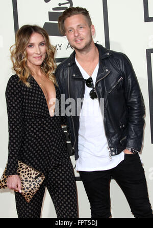 Ryan Tedder and his wife Genevieve Tedder arrive on the red carpet ...