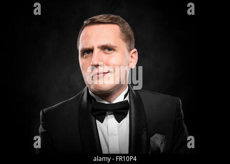 Skeptical businessman in suit Stock Photo - Alamy