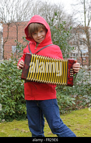 boy playing bandoneon Stock Photo: 100240256 - Alamy