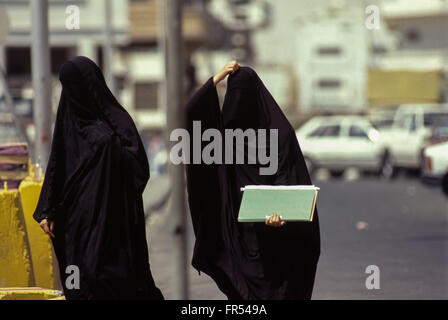 Three Saudi veiled women walking in Al Khobar, Eastern Province, Saudi ...