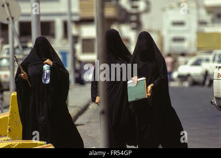 Three Saudi veiled women walking in Al Khobar, Eastern Province, Saudi ...