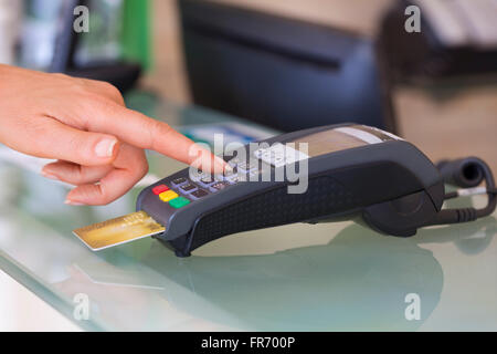 Paying with bank debit card through internet, shopping online with ...