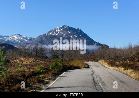Single track highway and passing place and tourist camper van on the ...