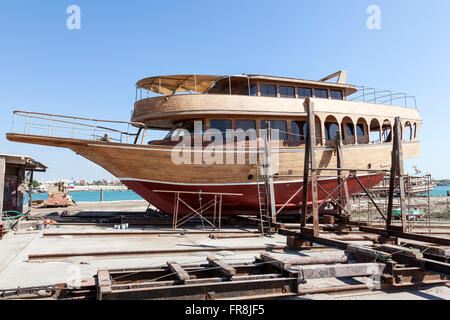 Traditional dhow in the dockyard of Manama, Kingdom of Bahrain Stock ...