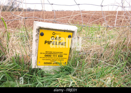 A gas pipeline marker post in the Norfolk countryside at Ringland ...