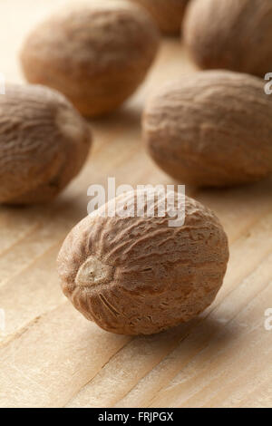 Close up of Nutmeg,Jaiphal,Myristica fragrans in a glass container with ...