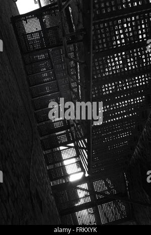 Fire Escape in Dark Alley. Footage. Typical emergency stairs from old ...