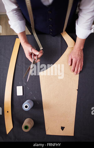 Tailor Man sewing Stock Photo - Alamy