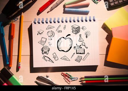 Overhead of students desk with notepad Stock Photo - Alamy