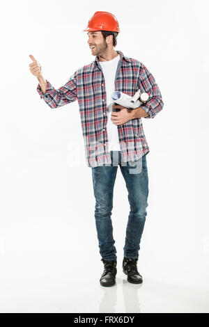 builder on isolated background with blueprints in arm Stock Photo - Alamy