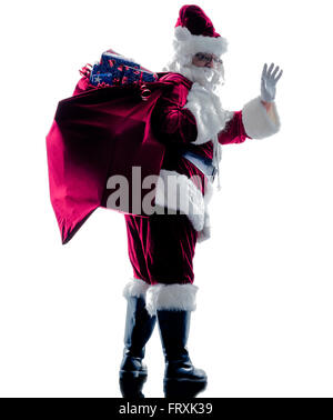 one santa claus man Saluting silhouette isolated on white background ...