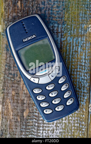 The Nokia 3310, a classic mobile phone released in the early 2000s ...