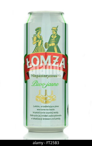 Lomza unpasteurized lager beer isolated on white background. Lomza ...