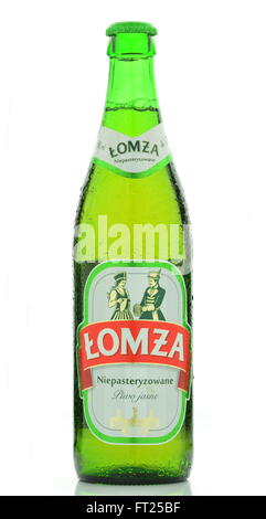 Lomza unpasteurized lager beer isolated on white background. Lomza ...