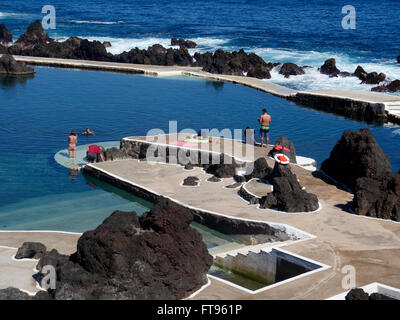 Natural swimming pools on volcanic region of Porto Moniz, Madeira island, Portugal Stock Photo ...
