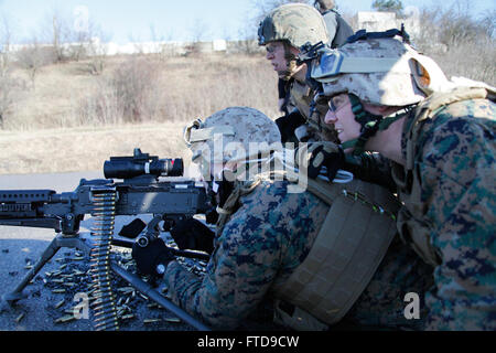 A U.S. Marine Security Guard (MSG) watchstander provides security while ...