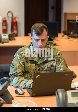 U.S. Air Force Col. Peter Fesler, 1st Fighter Wing commander, looks ...