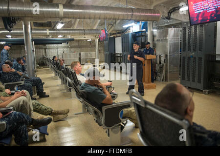 Engineman 3rd Class Sheila Allen conducts basic damage control training ...