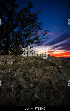 Sunset over Cheltenham, Gloucestershire from the top of a hill ...