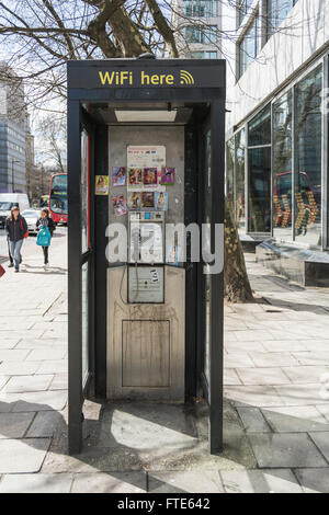 coins and cards phone box, public telephone box accepting coins and ...