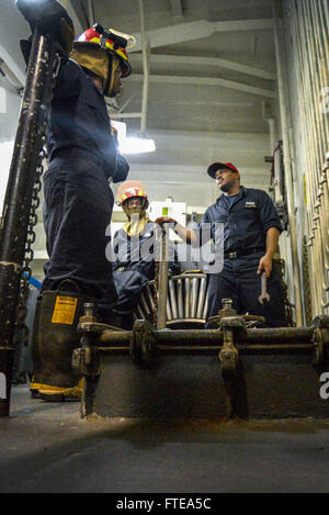 A damage control team conducts training aboard USS Ronald Reagan ...