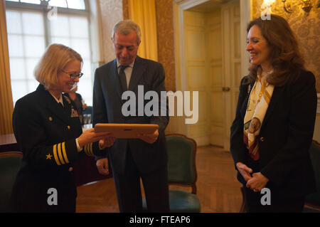 Cmdr. Camille Flaherty, left, commanding officer of the guided-missile ...