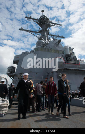 The guided missile destroyer USS SCOTT (DDG-995), second from the right ...