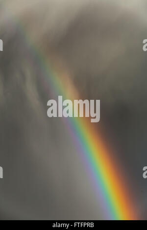 London, UK. 28th March, 2016. UK Weather: Colourful rainbow breaks ...