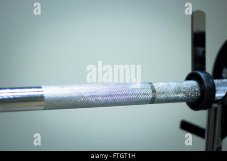 Olympic metal barbell in crossfit, bodybuilding and weight training ...