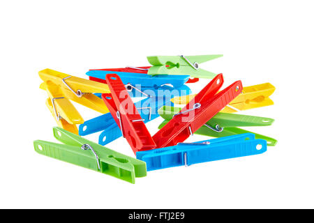 Orange clothes pegs over white background Stock Photo - Alamy