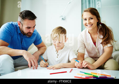Group of people smiling happy drawing in paint class at art studio ...