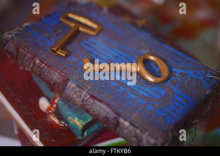 Old gold keys and notepads closeup Stock Photo - Alamy
