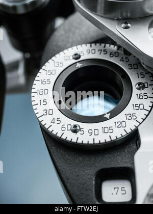 Photograph of a dial on a phoropter in an eye doctor's office. The dial ...