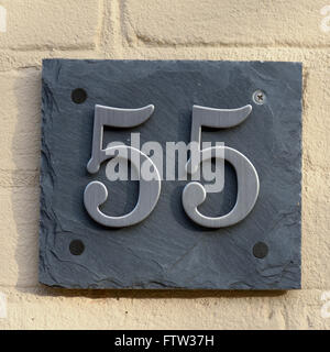 House number 55 sign on gate Stock Photo - Alamy