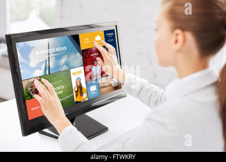woman with web pages on touchscreen in office Stock Photo - Alamy