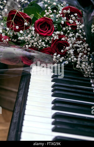 Piano and roses Stock Photo - Alamy