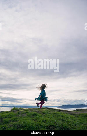 Girl twirling around Stock Photo - Alamy