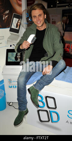 Jonathan Cheban helps out on the 3D Lipo stand at the Professional ...
