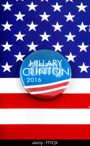A Hillary Clinton 2016 pin badge over the US flag symbolizing her ...