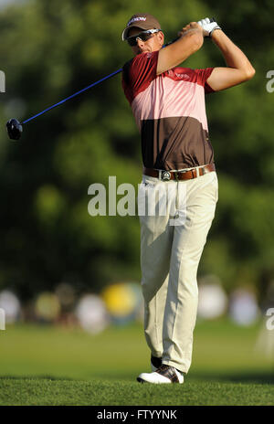 Henrik Stenson hits his tee shot on the 18th hole during the final ...