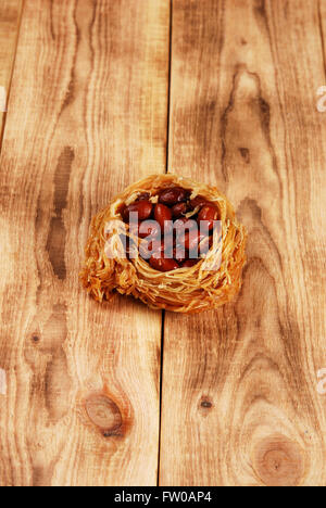 Eastern sweetness, baklava with peanuts and honey. Isolate. Selective ...